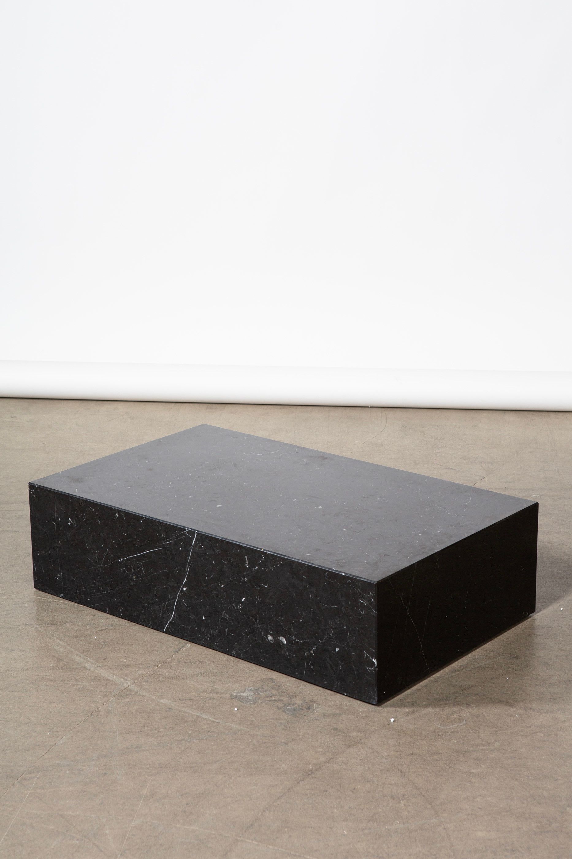 Plinth table, low, black Marquina marble | Franckly