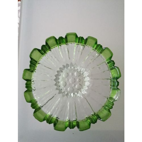 A green Ulpukka platter from Tauno Wirkkala's Kalevala series | Franckly
