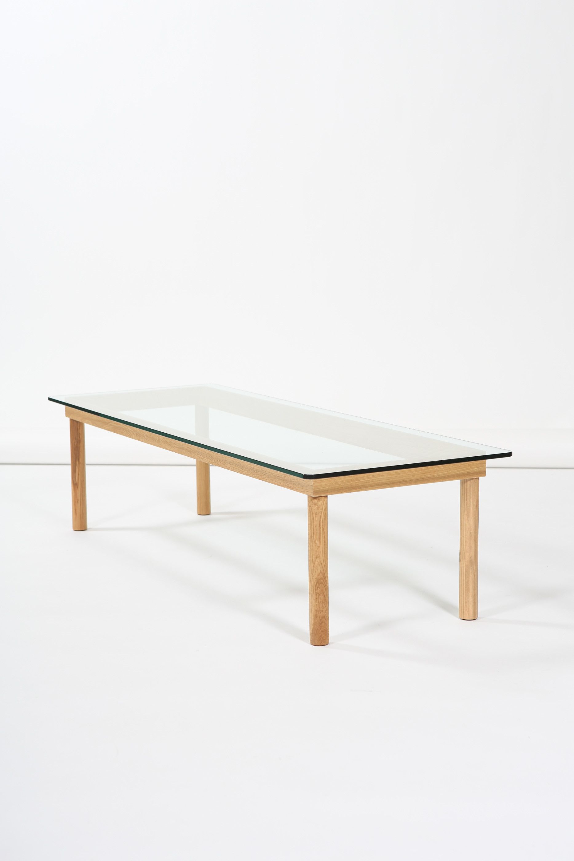 Kofi table 140 x 50 cm, lacquered oak - clear glass | Franckly